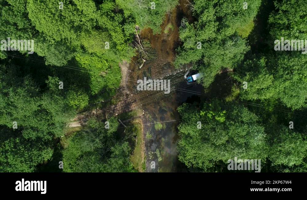 Cinematic overhead aerial drone camera footage you can see jeep car ...