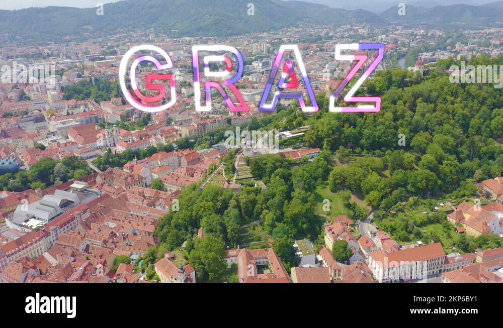 Inscription on video. Graz, Austria. Clock Tower in Graz. The historic ...