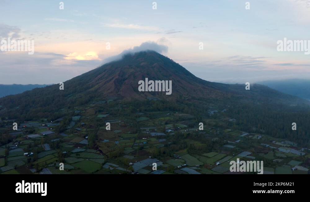 drone fly above peak of mount batur in Kintamani village island of bali ...