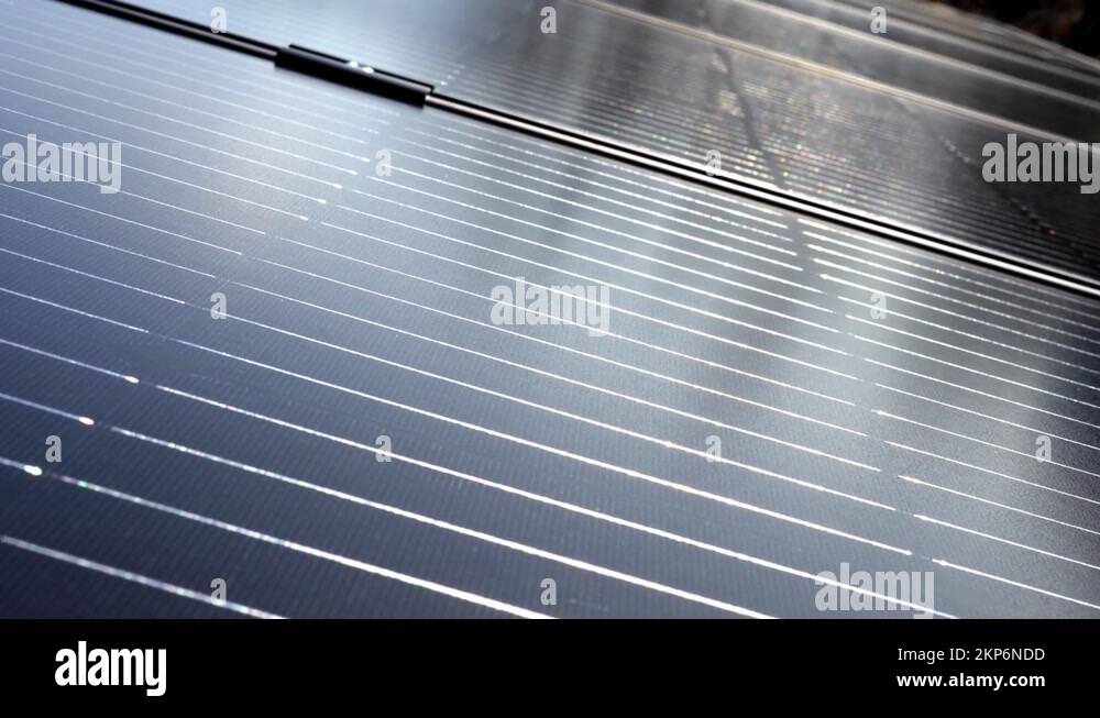 Sunlight hits surface of modern highly efficient solar panels - Closeup ...