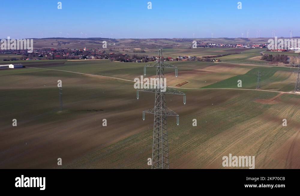 Pylon And High Voltage Powerline With A Background Of Blue Sky - drone ...