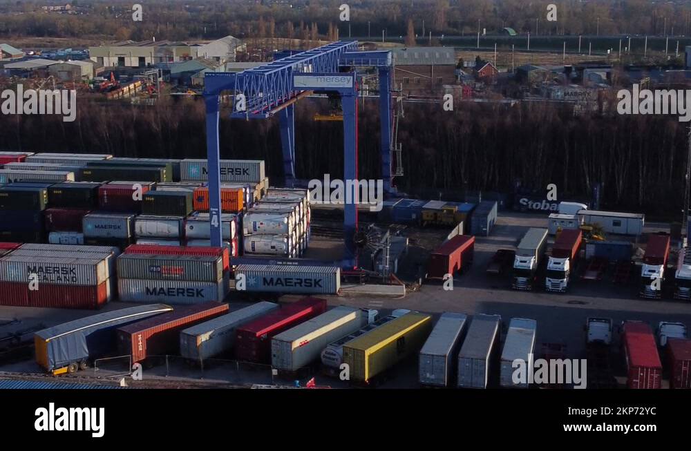 Shipping container crane lift unloading heavy cargo export crate Stock ...