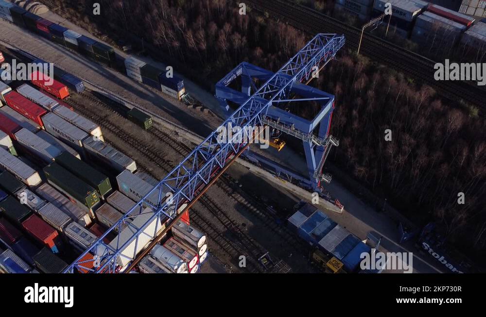 Shipping container crane lift unloading heavy cargo export crate Stock ...