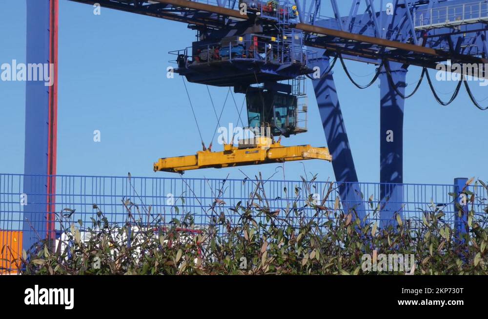 Shipping container crane lift loading heavy cargo shipyard containers ...