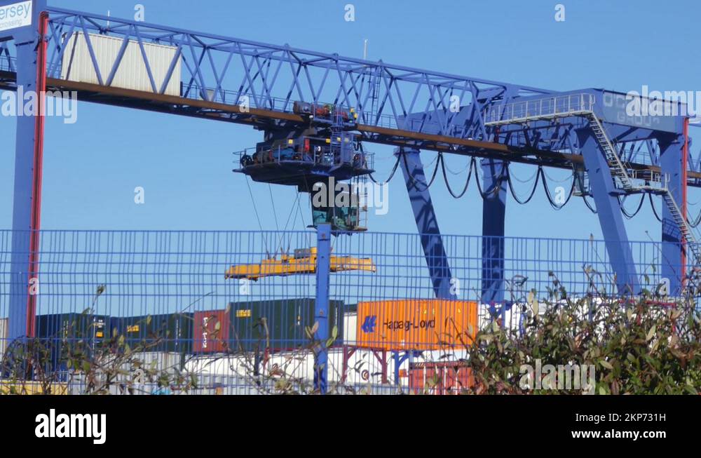 Shipping container crane lift loading heavy stacked cargo shipyard ...