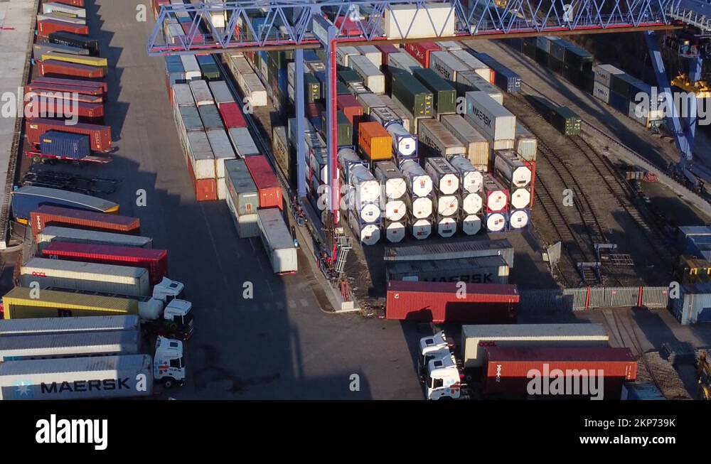 Shipping container crane lift unloading heavy cargo export crate Stock ...