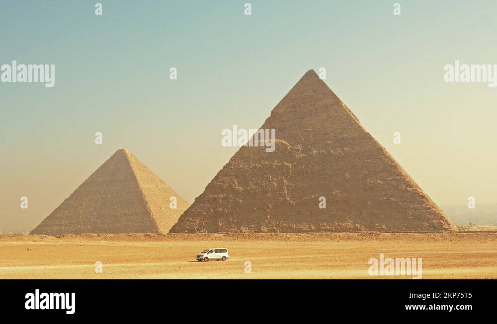 Tourist bus drives to pyramids on Giza Plateau Stock Video Footage - Alamy