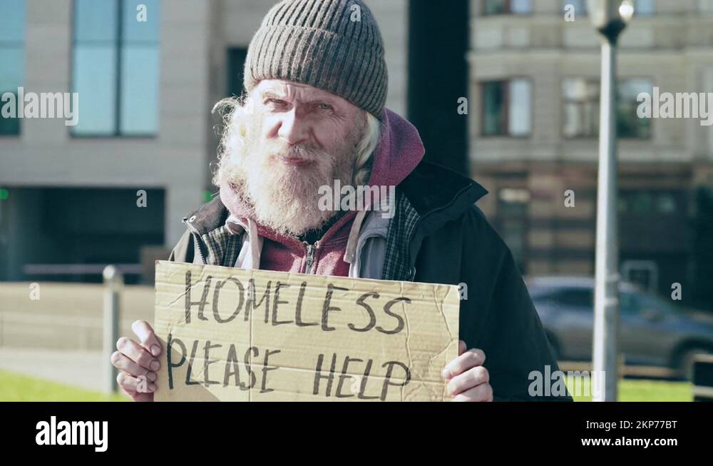 Homeless person with sign Stock Videos & Footage - HD and 4K Video ...