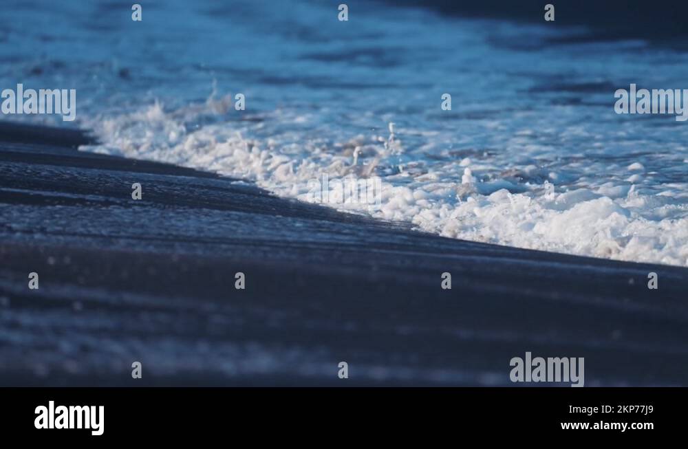 The powerful waves break around the sandy shallows on the Ersfjord ...