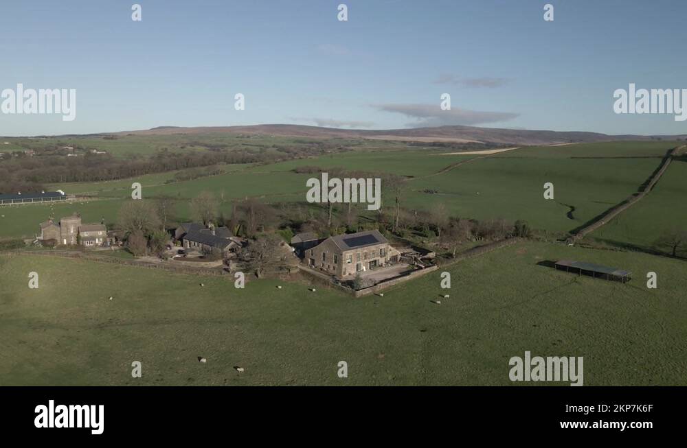 Old English stone farm house with sheep pasture and solar panels Stock ...