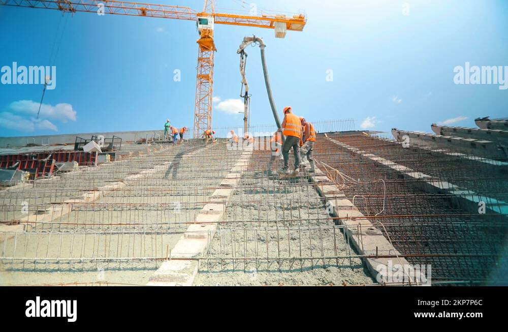 Building construction. Working process at a construction site. Builders ...