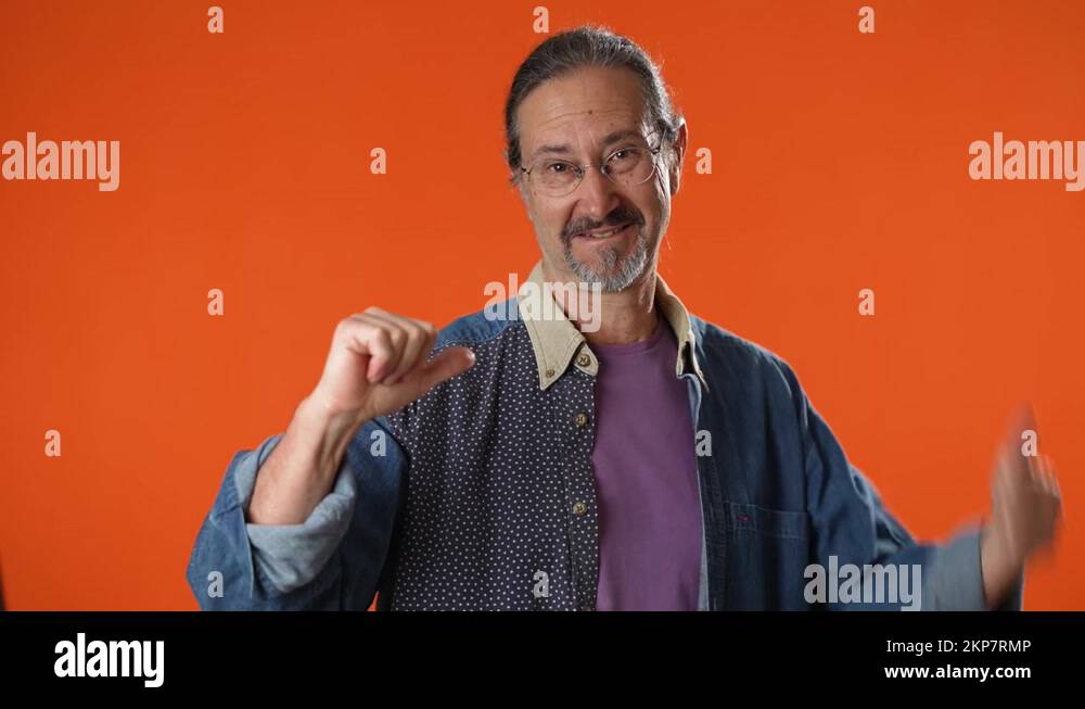 Confident fun elderly bearded man 50s 60s pointing fingers on himself ...