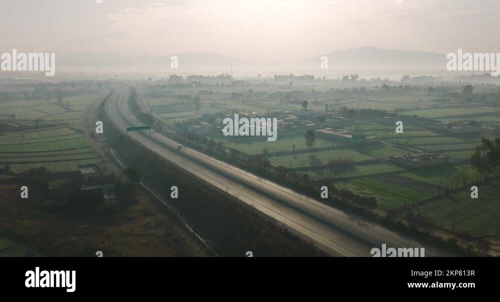 An aerial view of traffic on the National Highway of Pakistan, in the ...