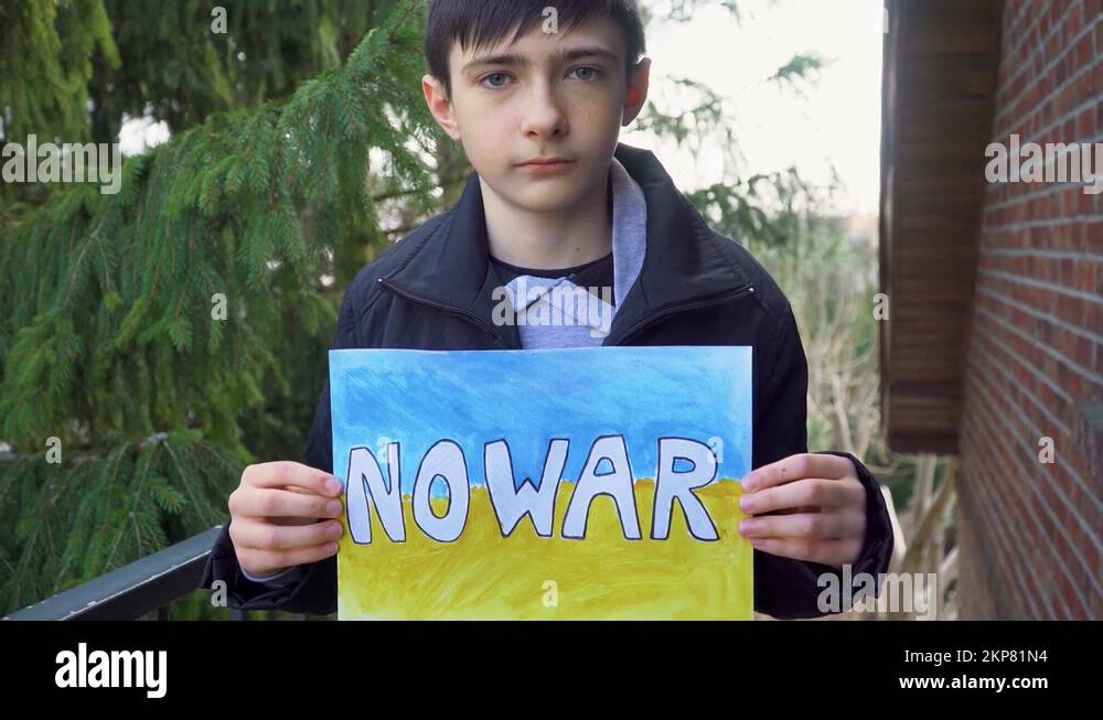 Ukrainian poor boy kid homeless protesting armored conflict holding ...