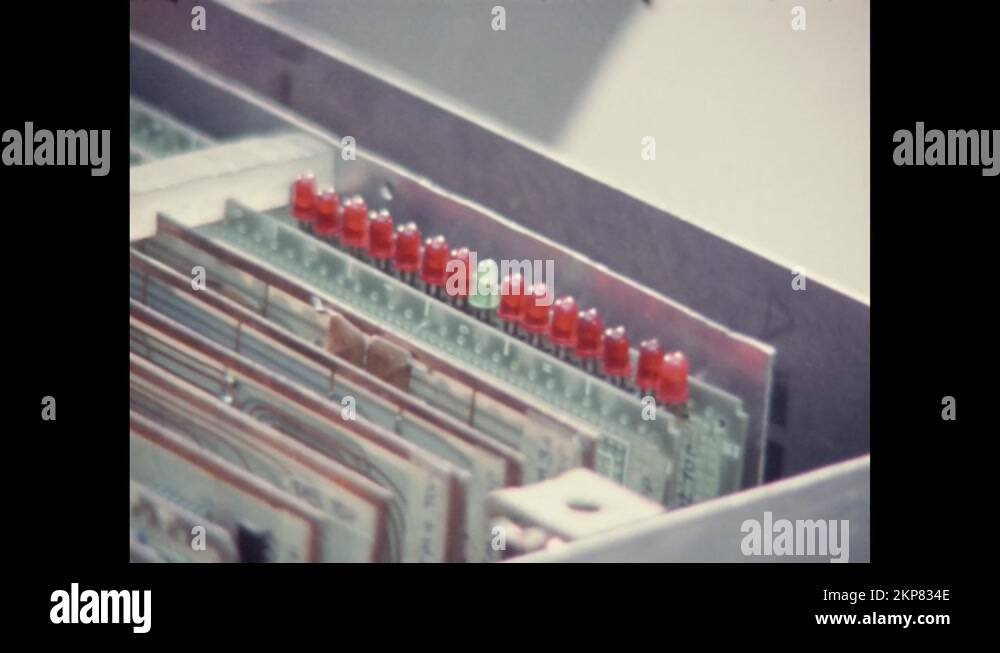 1970s: Flashing LEDs on a circuit board. Spinning motors, gears, and ...