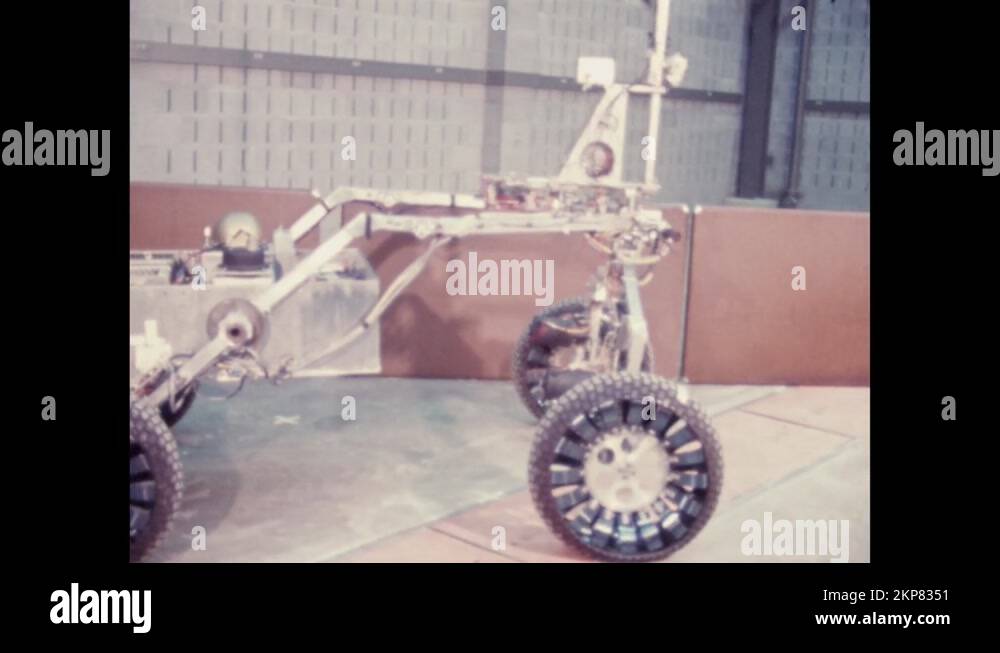 1970s: Prototype mars rover driving past and around obstacles Stock ...