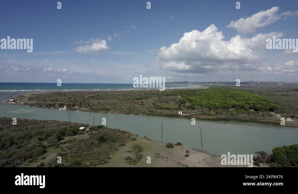 drone video a few meters above the mouth of the Shkumbin river, albania ...