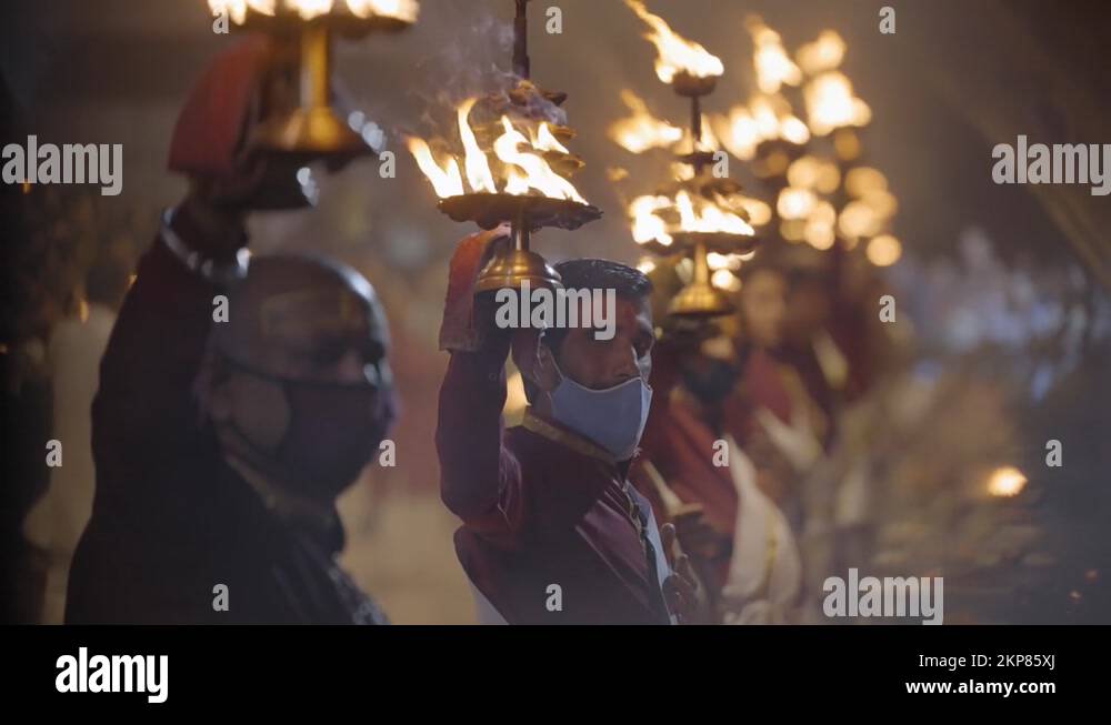 Priests At The Religious Ganga Fire Of Aarti Ritual In Triveni Ghat ...