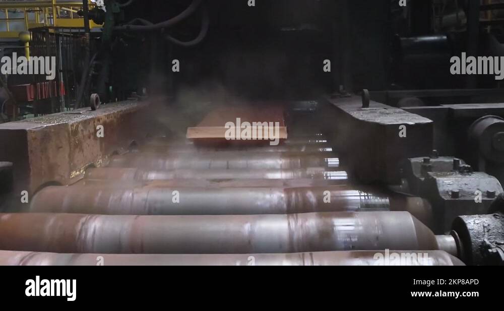 Hot Copper Sheet Cooling Off While Sliding On An Industrial Roller Line ...