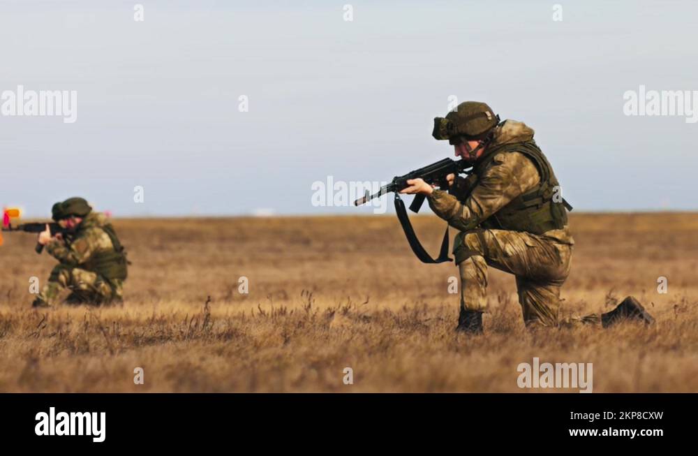 Russian spetsnaz soldier with Kalashnikov assault rifle in camouflage ...