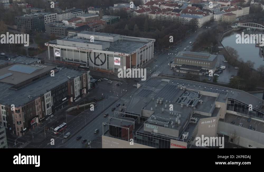 Strong zoom in with drone into Tartus Kaubamaja big shopping mall in ...