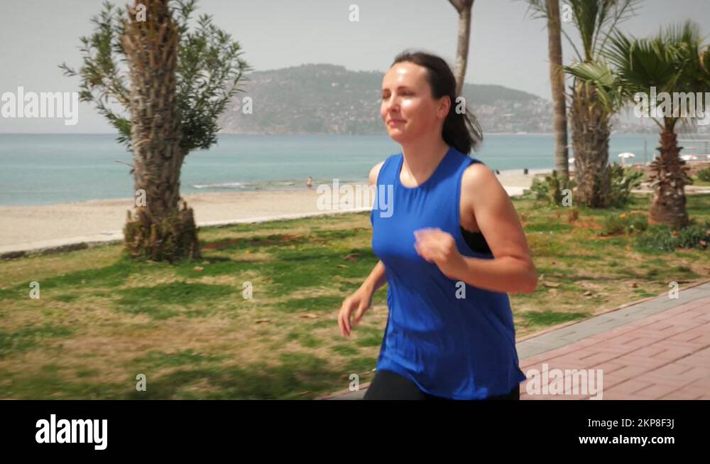 Woman running near seashore female Stock Videos & Footage - HD and 4K ...
