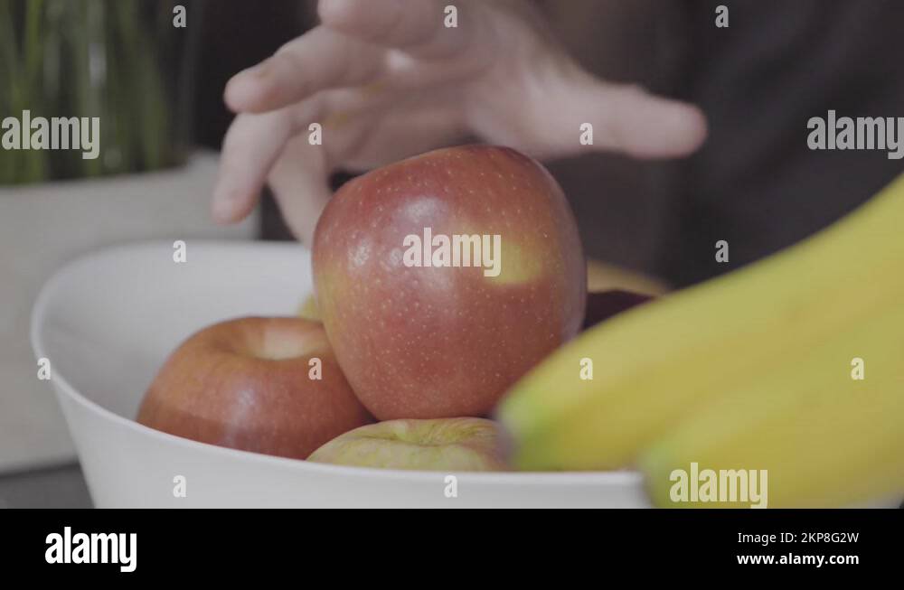 Grab an apple Stock Videos & Footage - HD and 4K Video Clips - Alamy