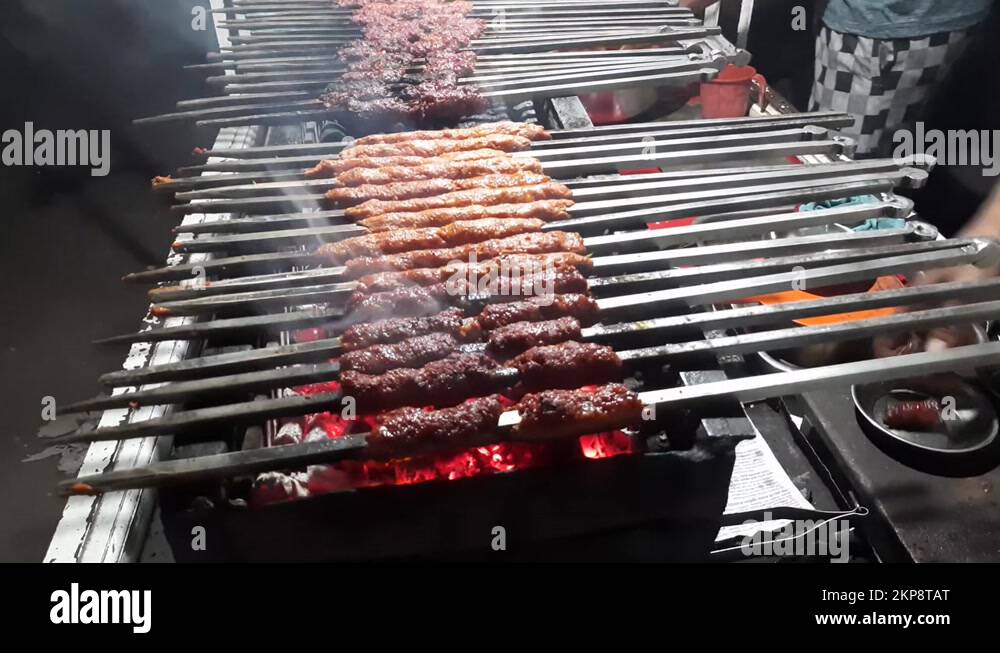 A Close-up Video Footage of Mutton Seekh Kabab On Coal Furnace ...