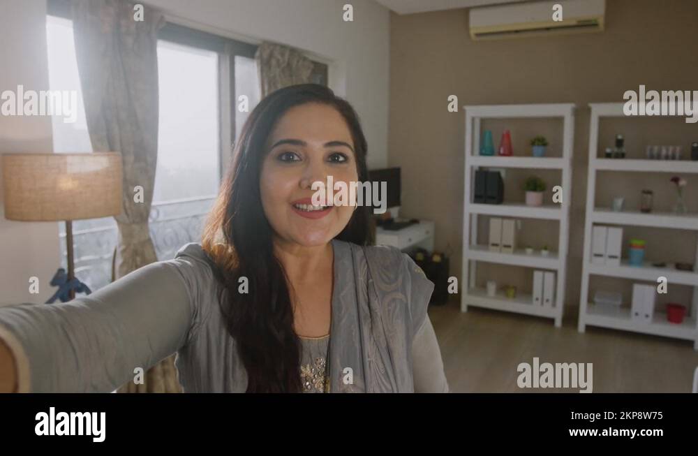 Smiling Indian Middle Aged Husband Wife Taking Selfie Photo From A Mobile Phone Stock Video 5208