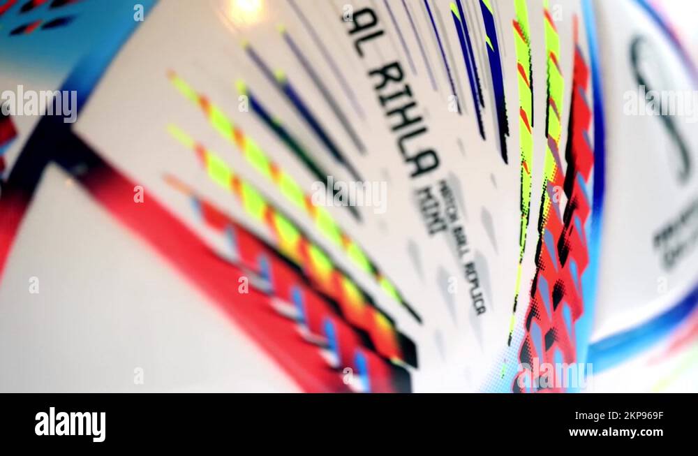 A Macro rotating close up to a FIFA World Cup Qatar 2022 logo of an Al ...