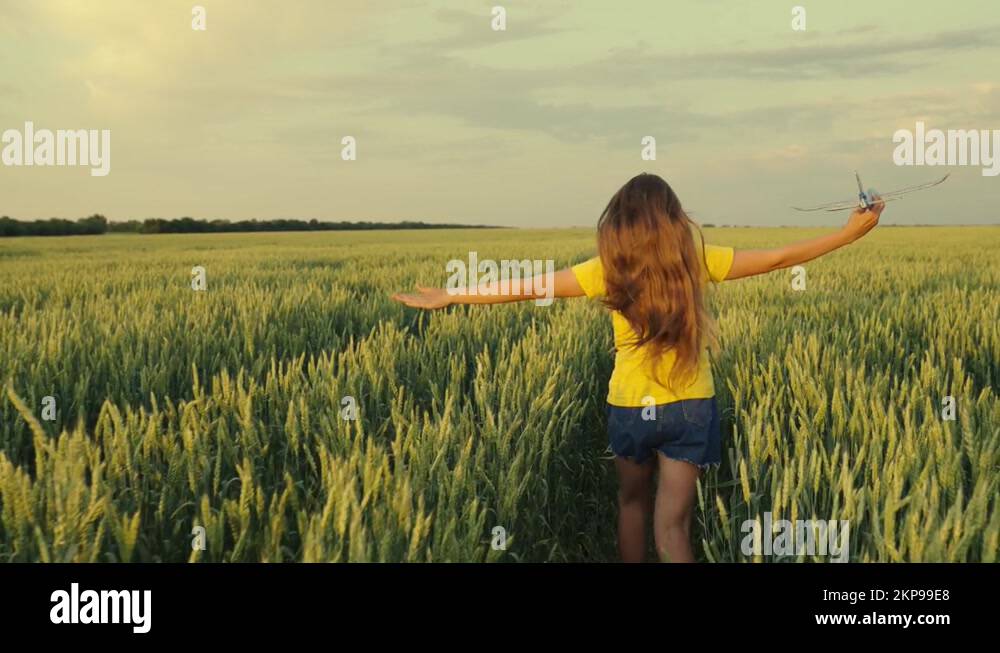 Girl, child dream to become pilot and fly. Teenage girl runs with toy ... Girl, child dream to become pilot and fly. Teenage girl runs with toy ...