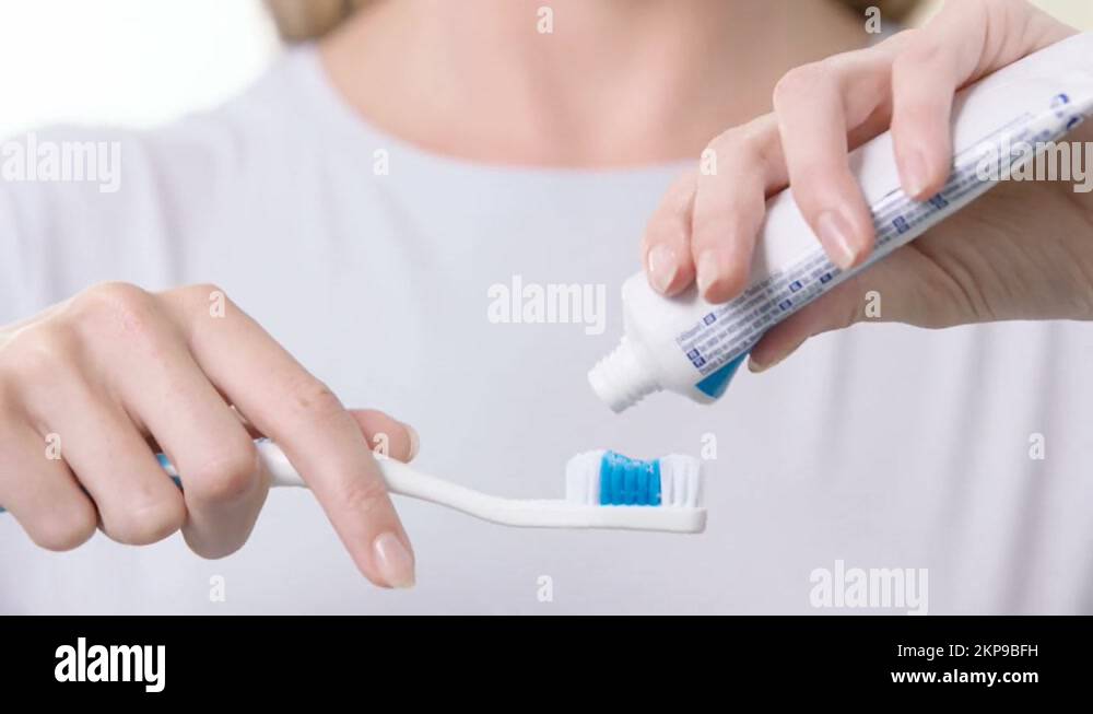 Applying toothpaste Stock Videos & Footage - HD and 4K Video Clips - Alamy