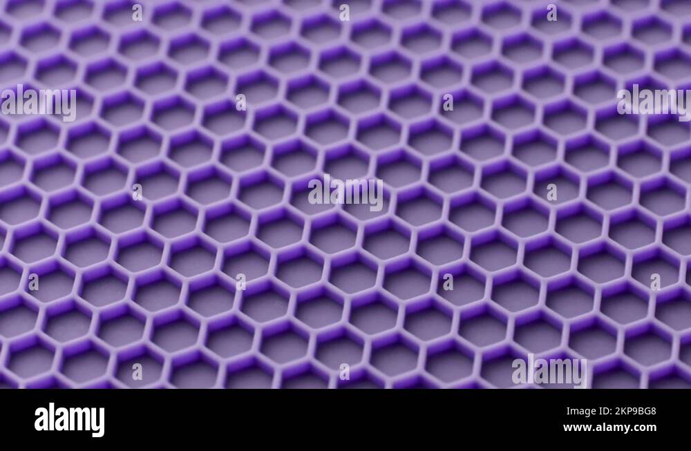abstract purple honeycomb pattern looped spinning full-frame background ...