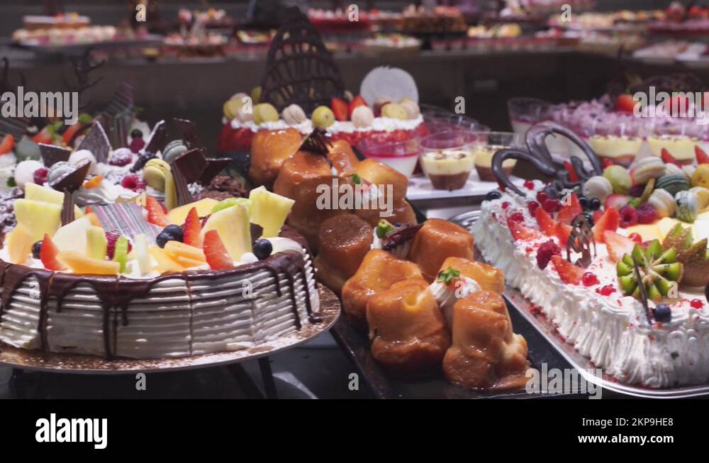 Table of cakes Stock Videos & Footage - HD and 4K Video Clips - Alamy