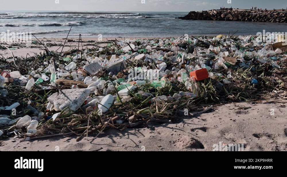 Close-up.Plastic pollution on a beach.Environmental damage to the ...