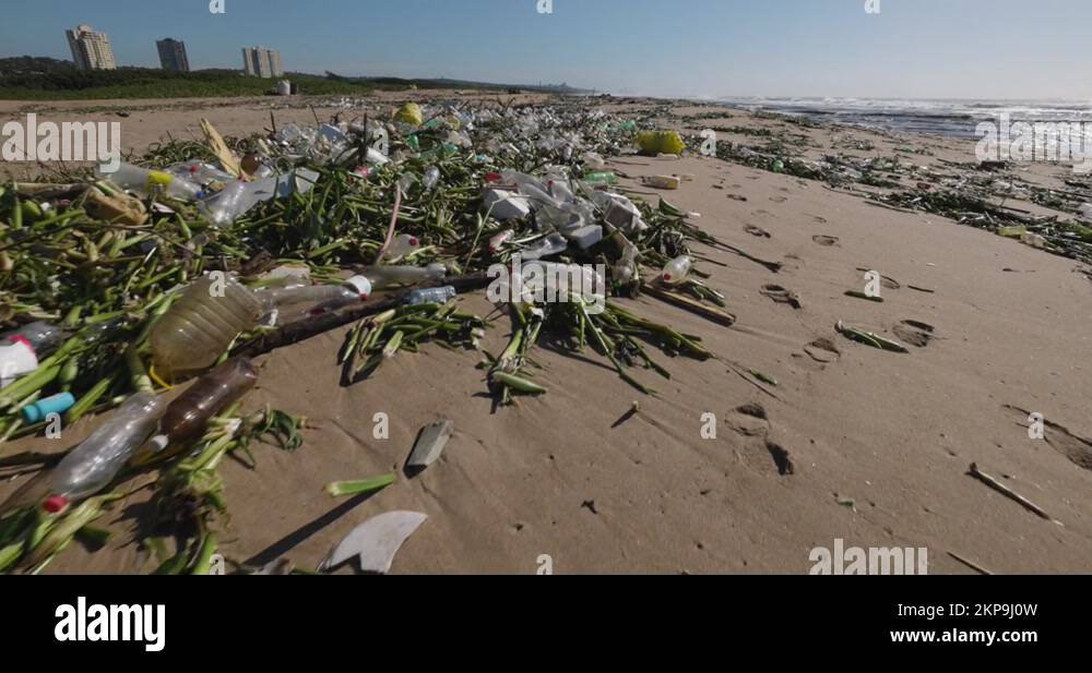 Close-up.Plastic pollution on a beach.Environmental damage to the ...