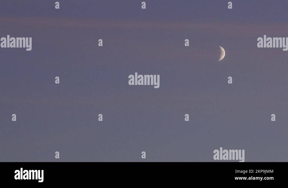 Crescent moon and dark night sky Stock Video Footage - Alamy