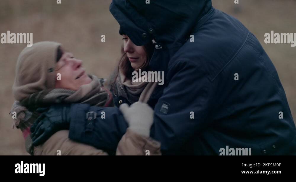 Distraught Refugee Woman Crying And Embracing Family During War Stock ...