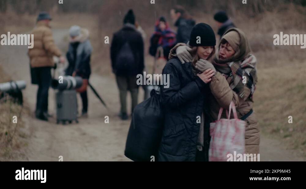 Refugee Woman Consoling Crying Daughter During War Stock Video Footage ...