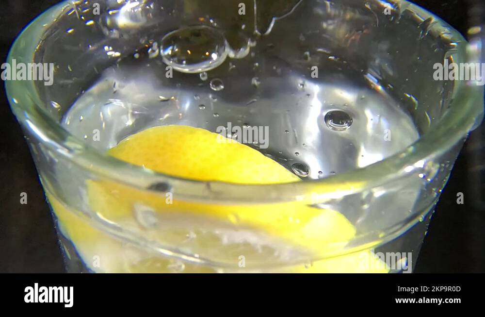 Slice of lemon dropping into water Stock Videos & Footage - HD and 4K ...