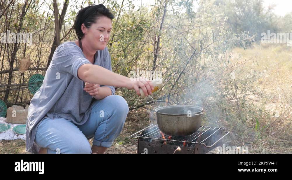 Oil tree woman pot Stock Videos & Footage - HD and 4K Video Clips - Alamy