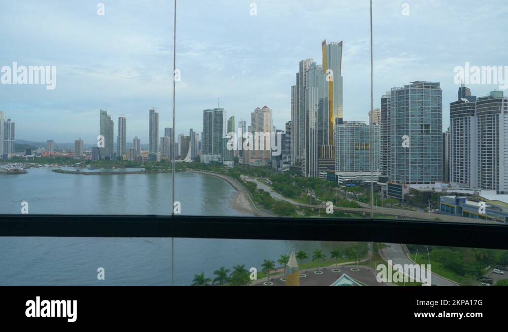 CLOSE UP: Massive luxury hotel room window offers a stunning view of ...