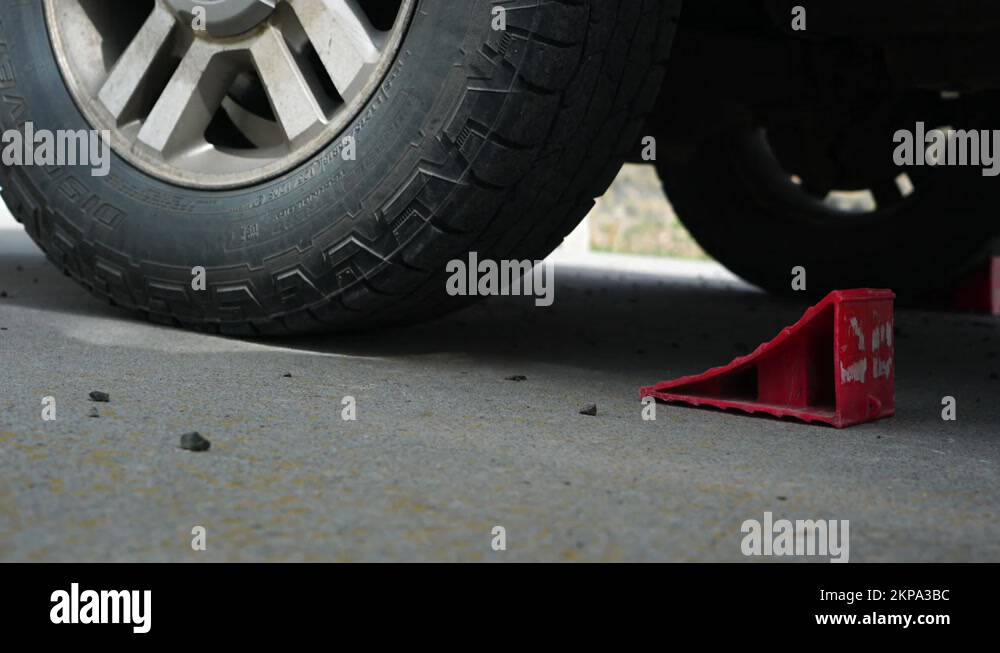 Tire wedge Stock Videos & Footage - HD and 4K Video Clips - Alamy