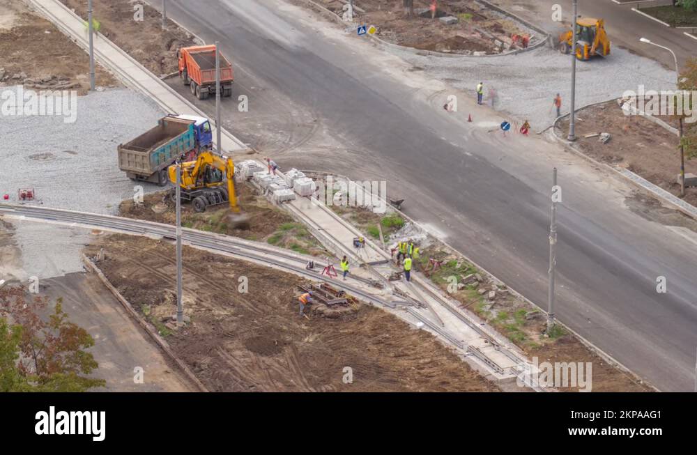 Industrial truck loader excavator moving ground and loading into a ...