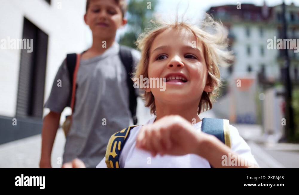 Two kids going to school Stock Videos & Footage - HD and 4K Video Clips ...