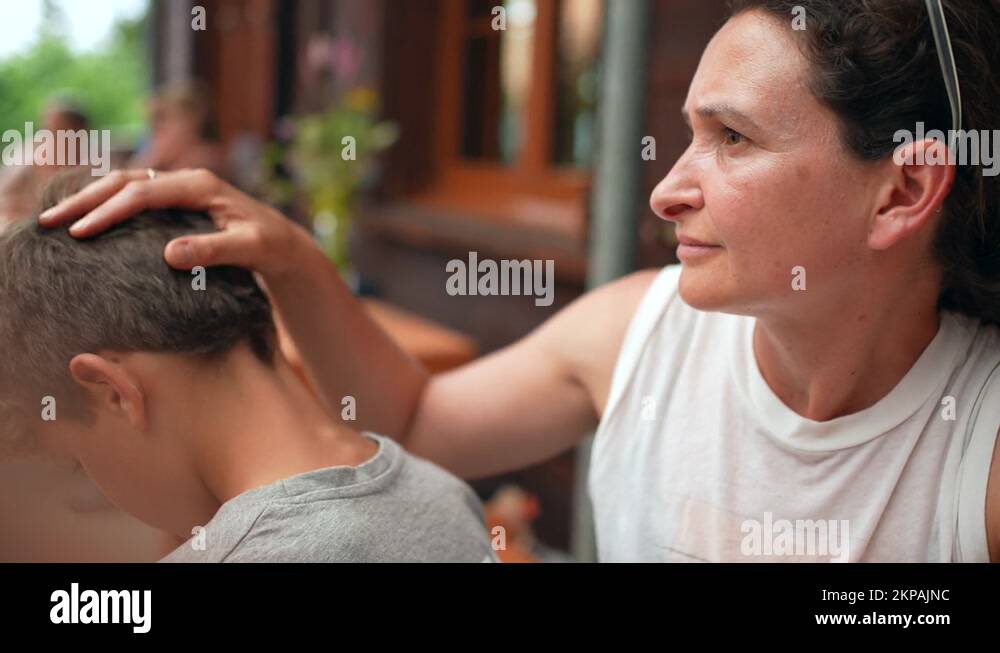 Mother caressing son hair mom comforting affection child Stock Video ...