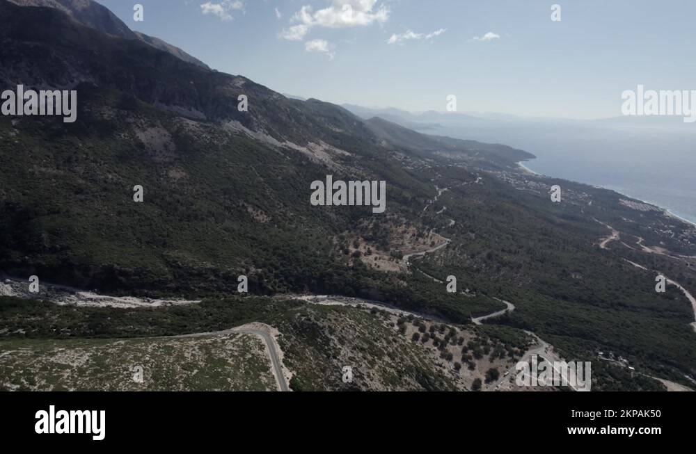 drone video over the Llogara mountain pass on SH8, Albania. Front shot ...