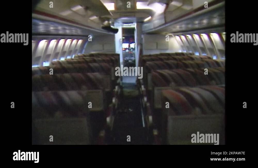 Interiors of commercial jet POV, Walking Up Aisle towards cockpit ...