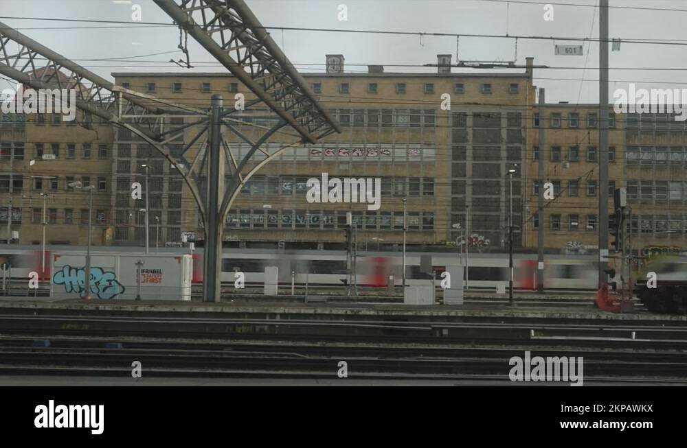Train station with passenger and freight cars time lapse with passing ...