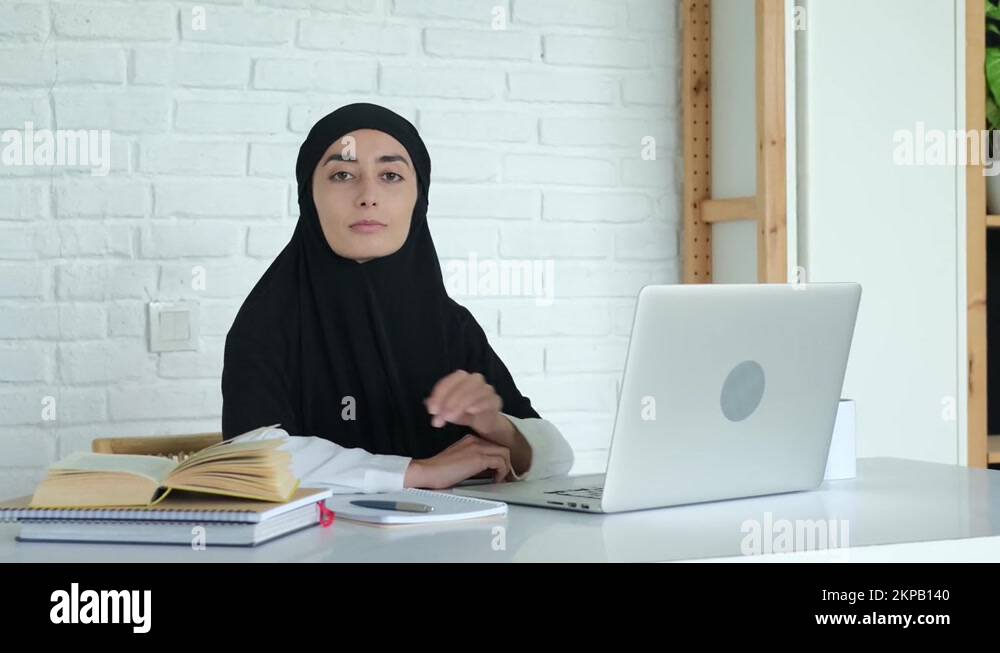 Muslim woman on distance learning. A Muslim woman who has the right to ...